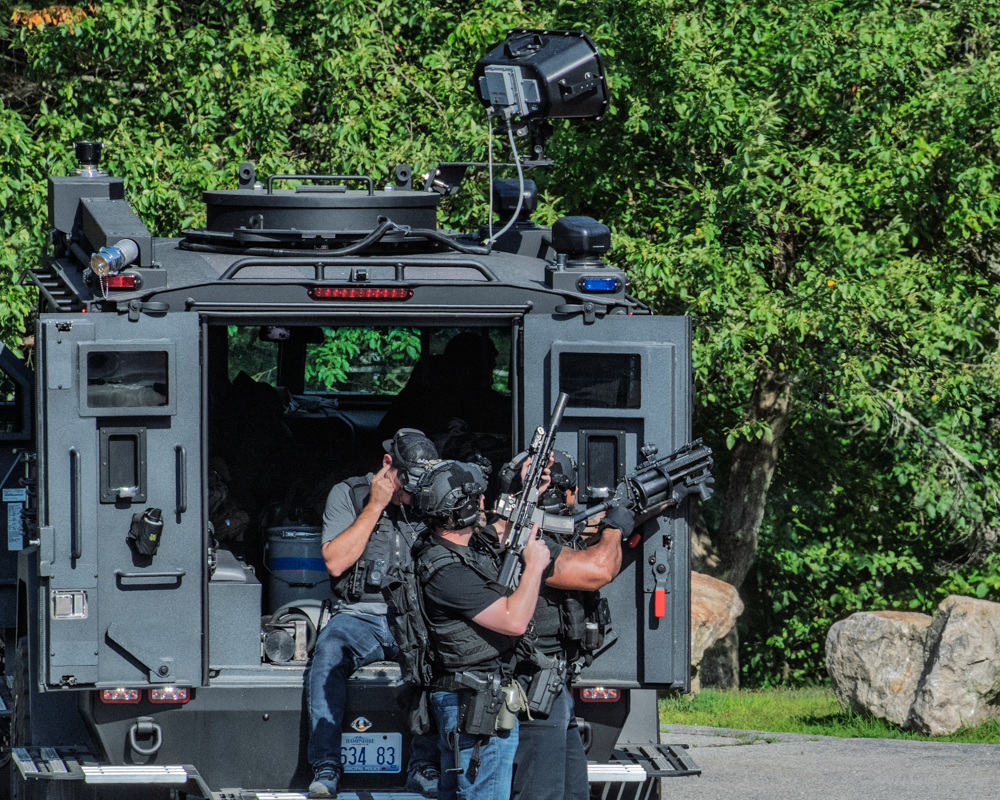 SWAT stages at apartment complex seeking ex-cop wanted on several ...