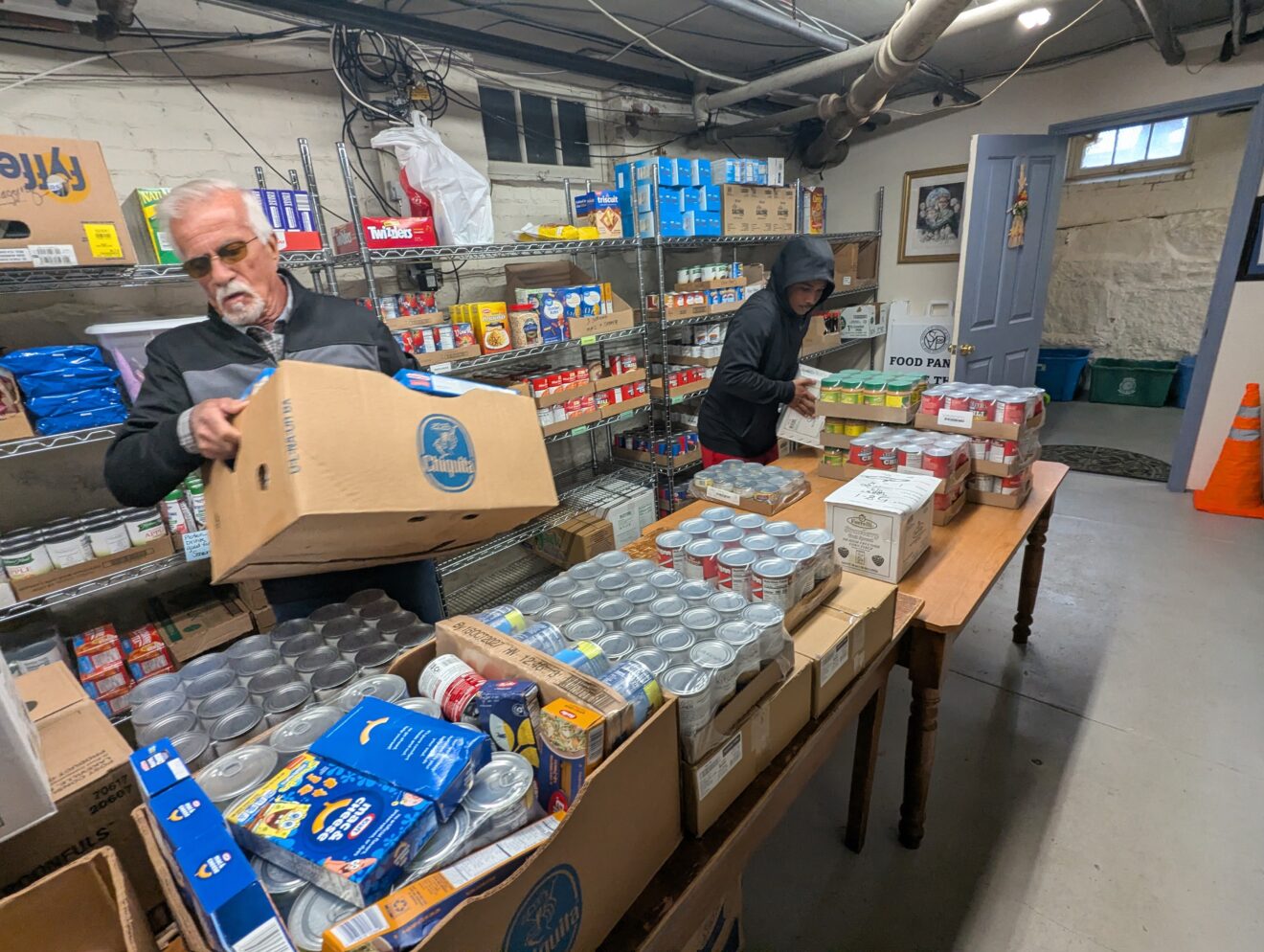 Many hands make light work at West Side food pantry, where demand has ...
