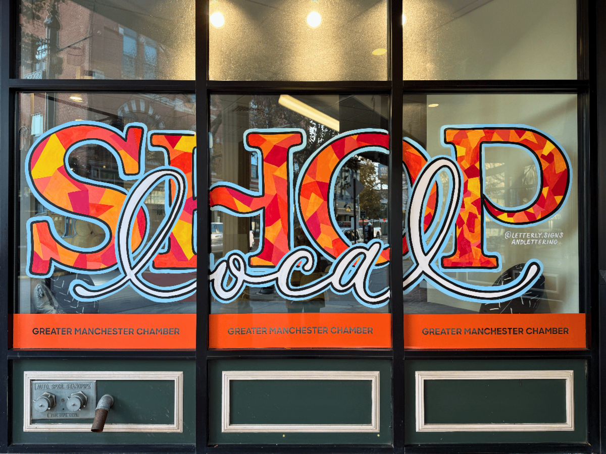 Vote for your favorite holiday painted window display in downtown ...